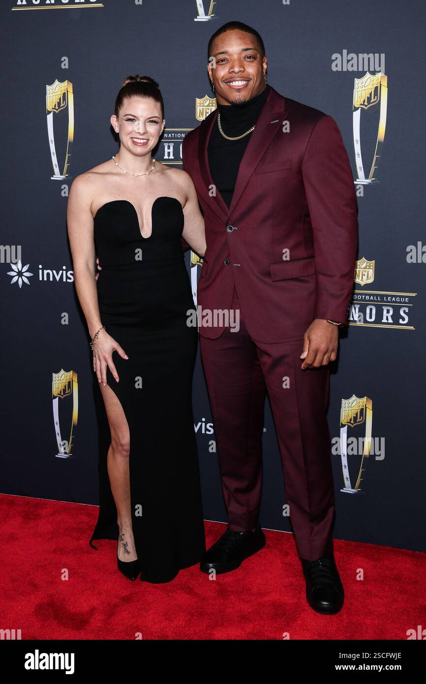 New Orleans, USA. 06th Feb, 2025. Stephanie Ham and C.J. Ham walking on ...