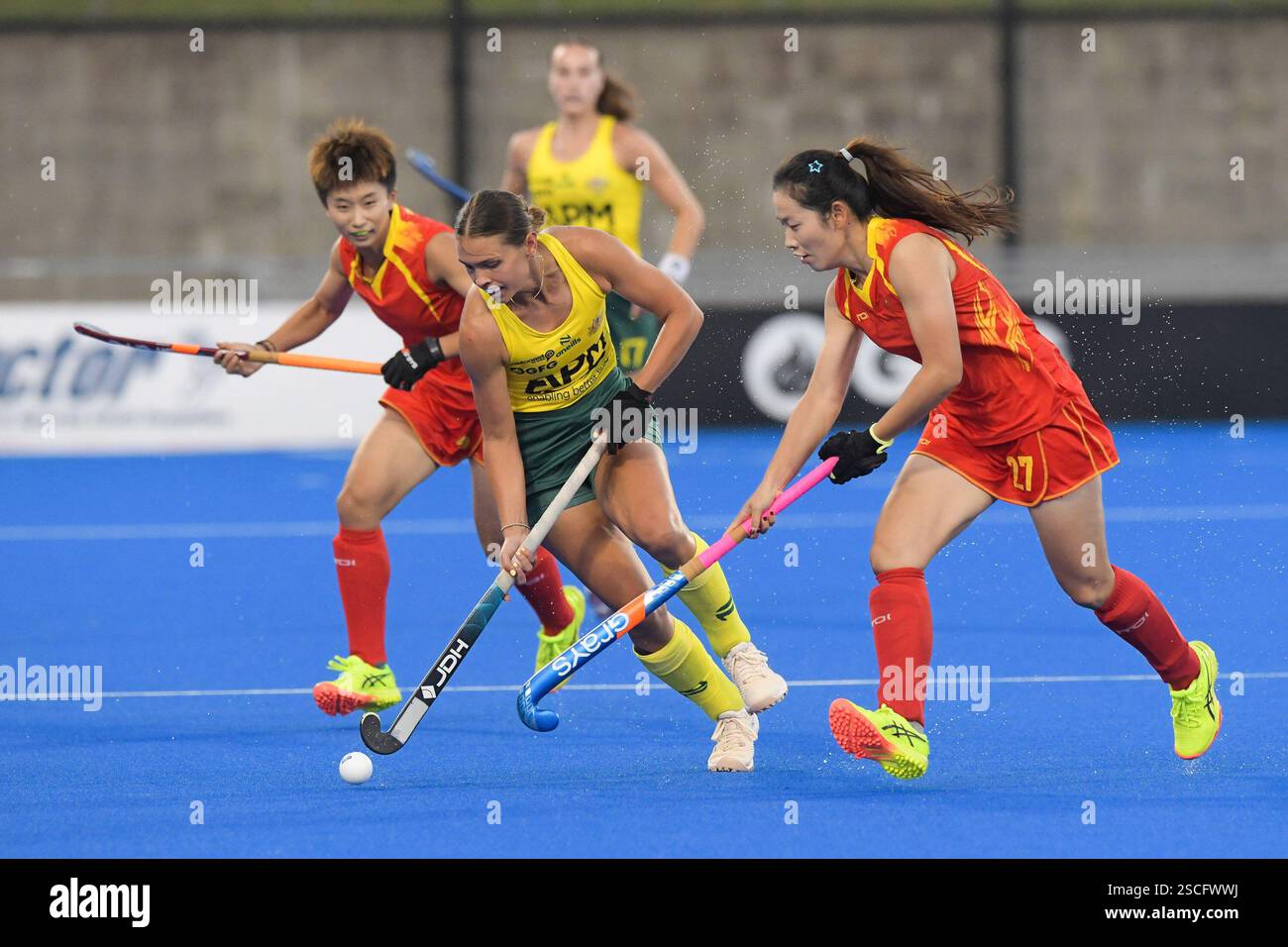 Morgan Mathison (C) of Australia Women Hockey team, Liu Chencheng (L ...