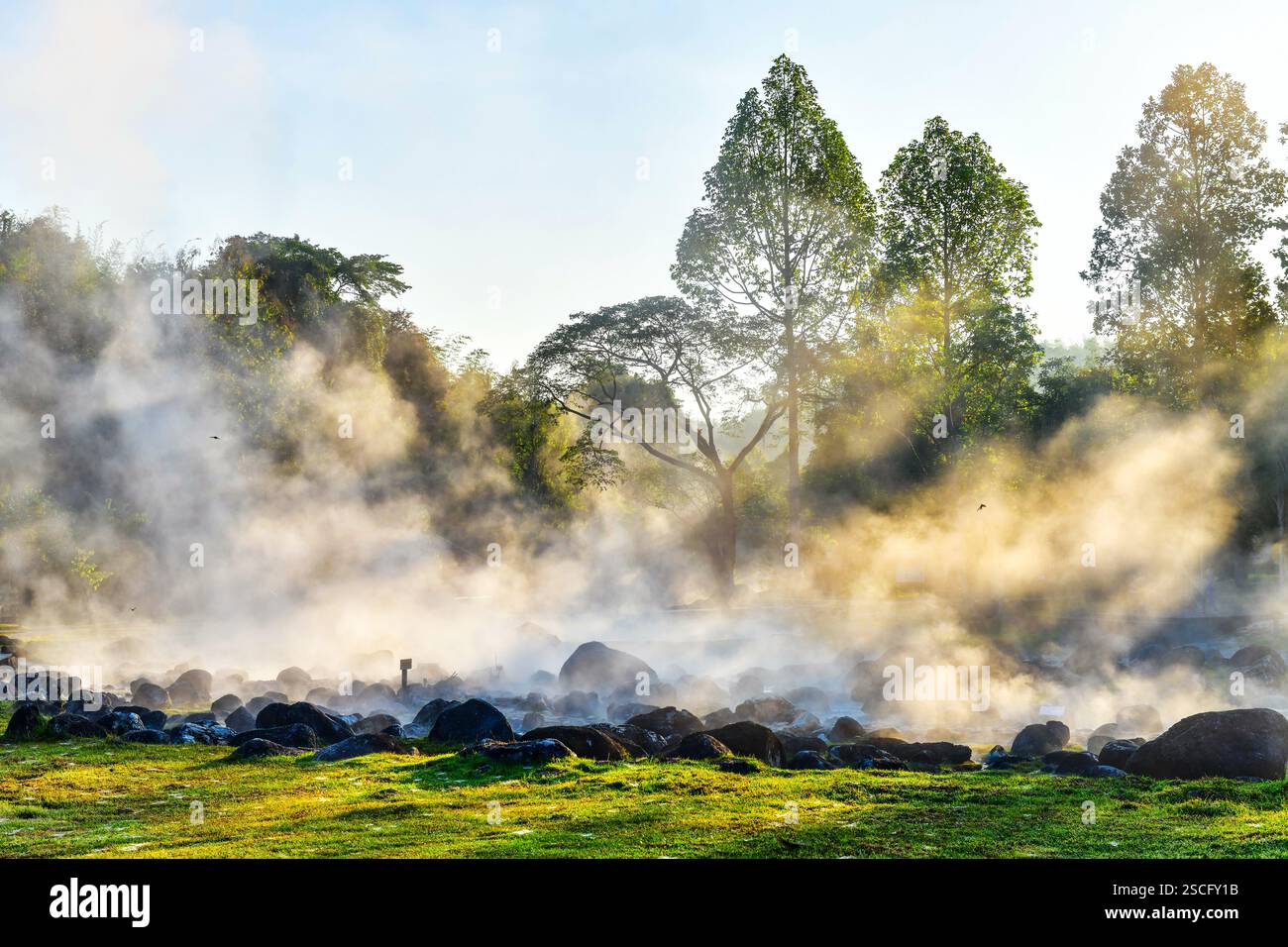 Natural hot spring with misty and morning sunrisewarm sunlight at Chae ...