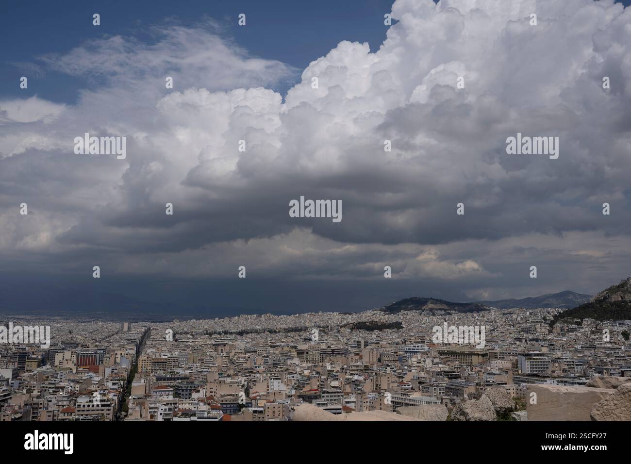 City of Athens, Greece under dramatic clouds viewed from the Acropolis ...