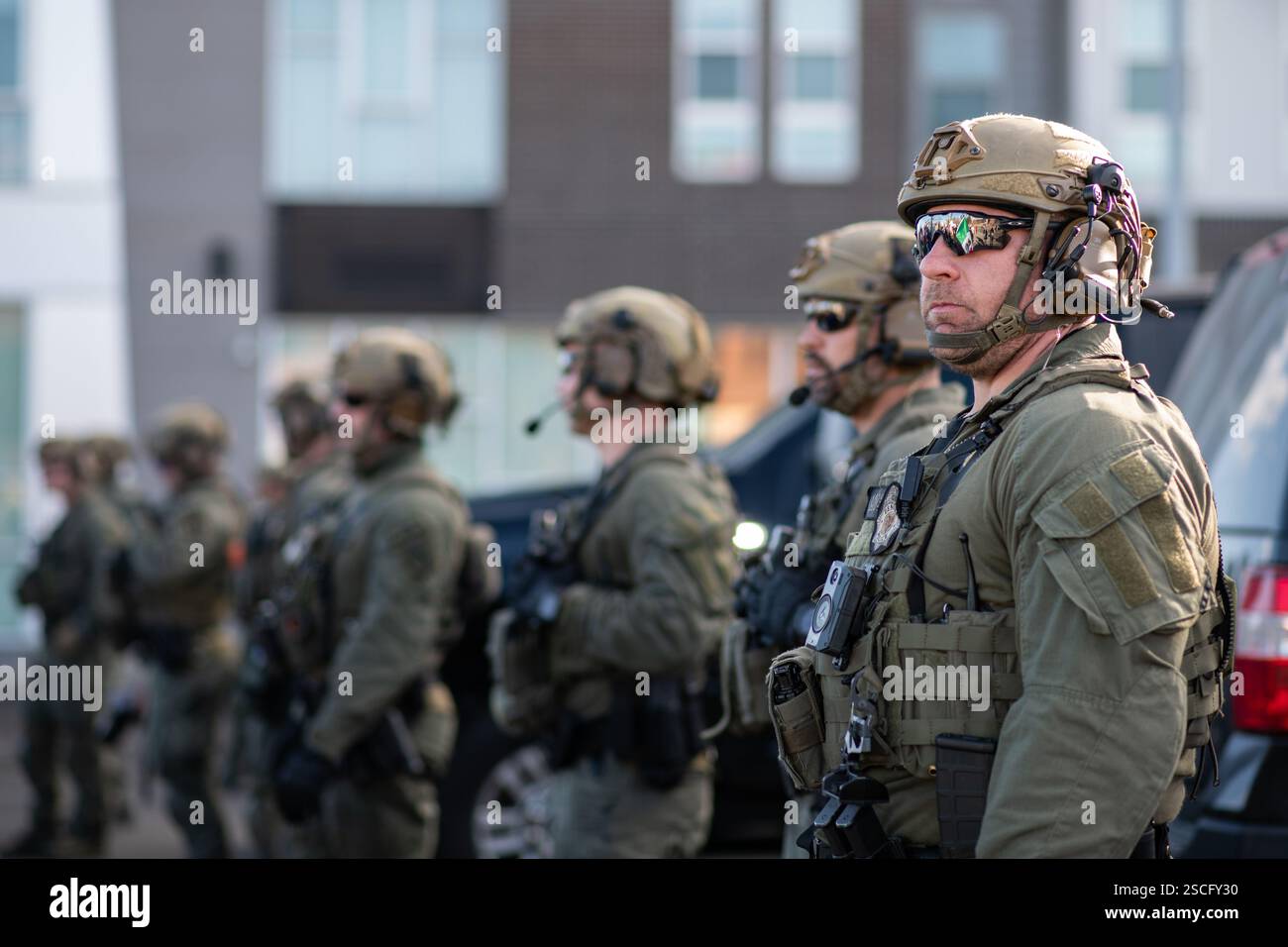 Denver, Colorado, USA. 5th Feb, 2025. Denver Police officers hold a ...
