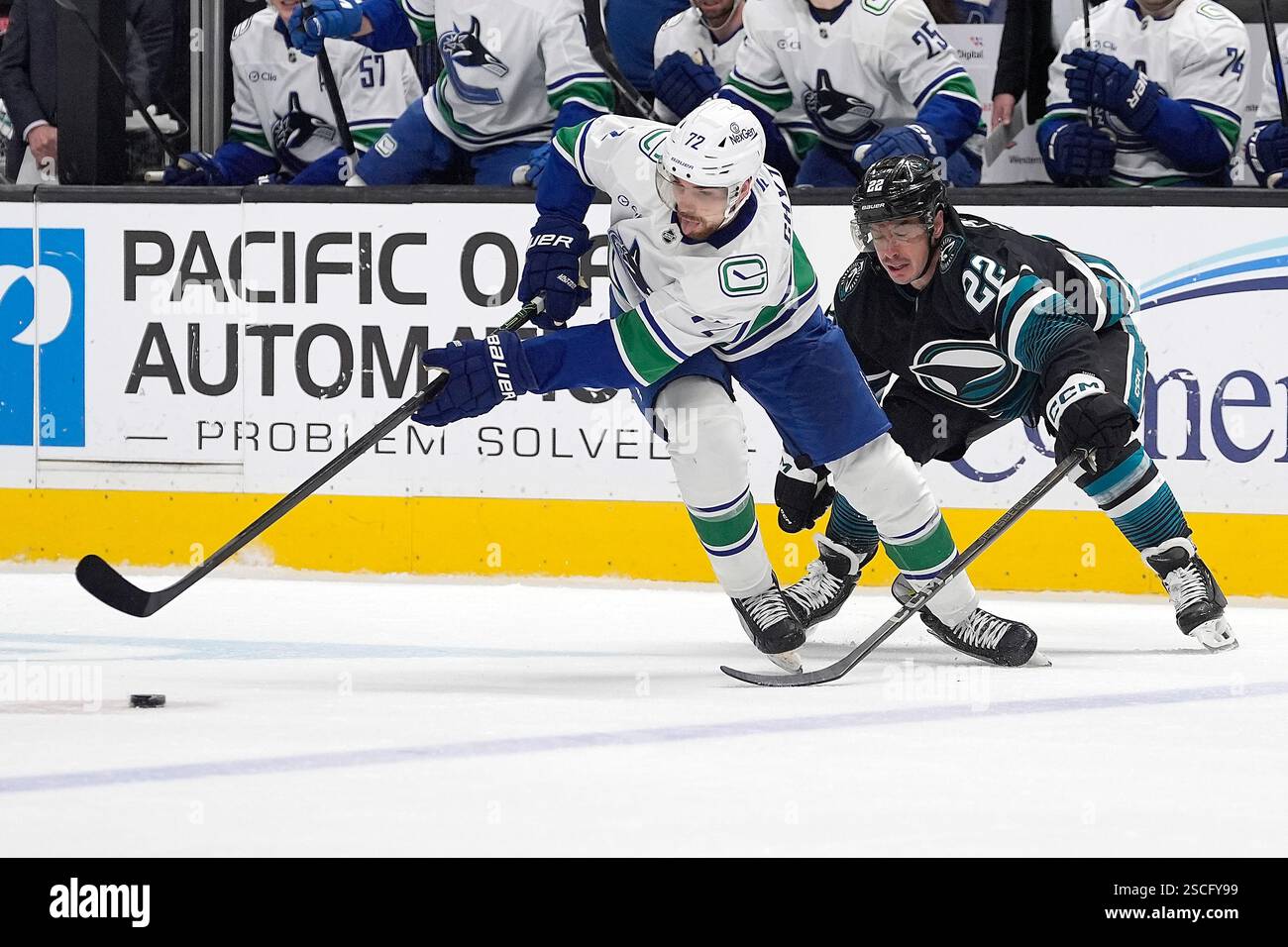 Vancouver Canucks center Filip Chytil (72) skates with the puck past ...
