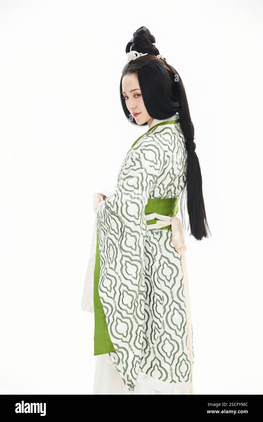 Teenage girl dressed in Chinese Han Dynasty costume on white background ...
