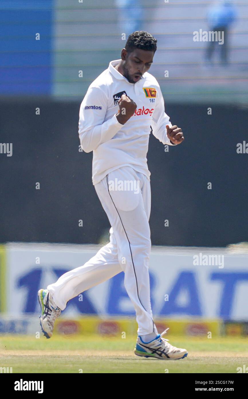 Sri Lanka's Nishan Peiris celebrates the wicket of Australia's Travis ...