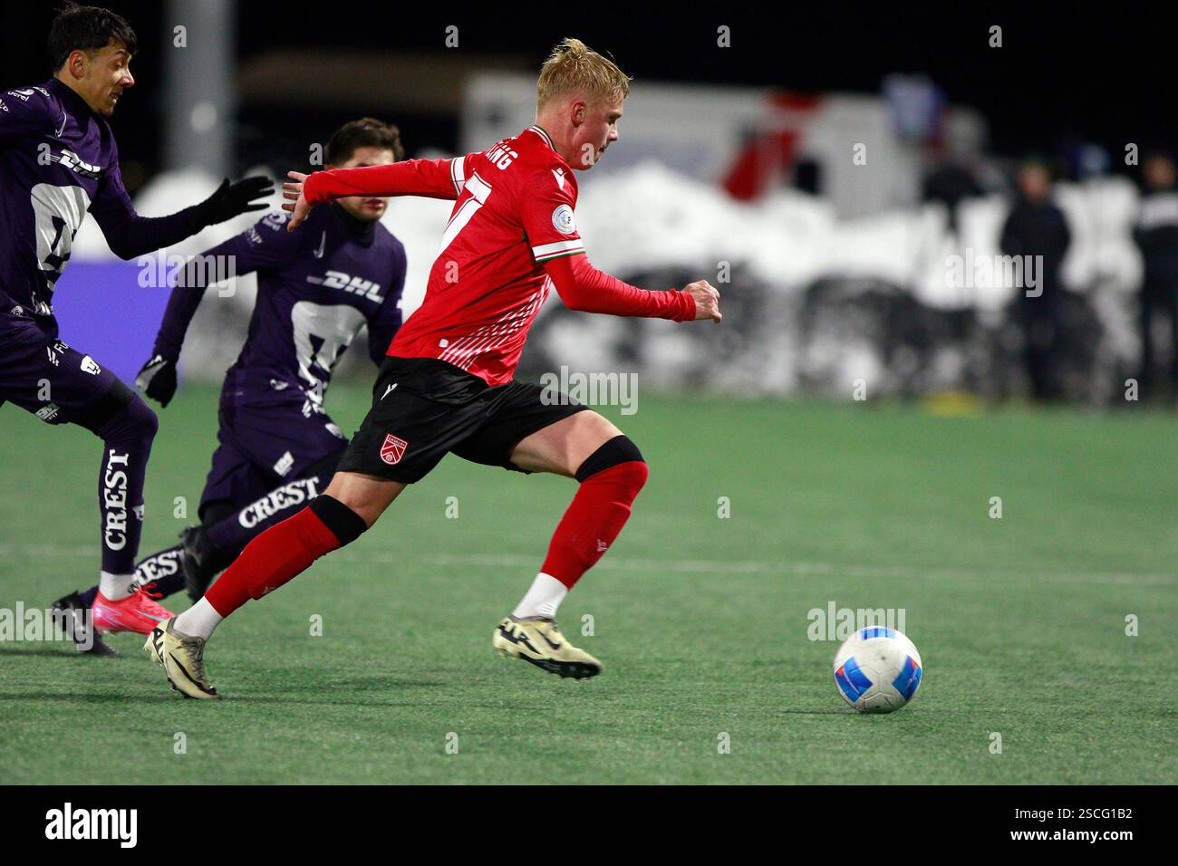 Cavalry FC's Nicolas Wahling, right, sprints away from Pumas UNAM ...
