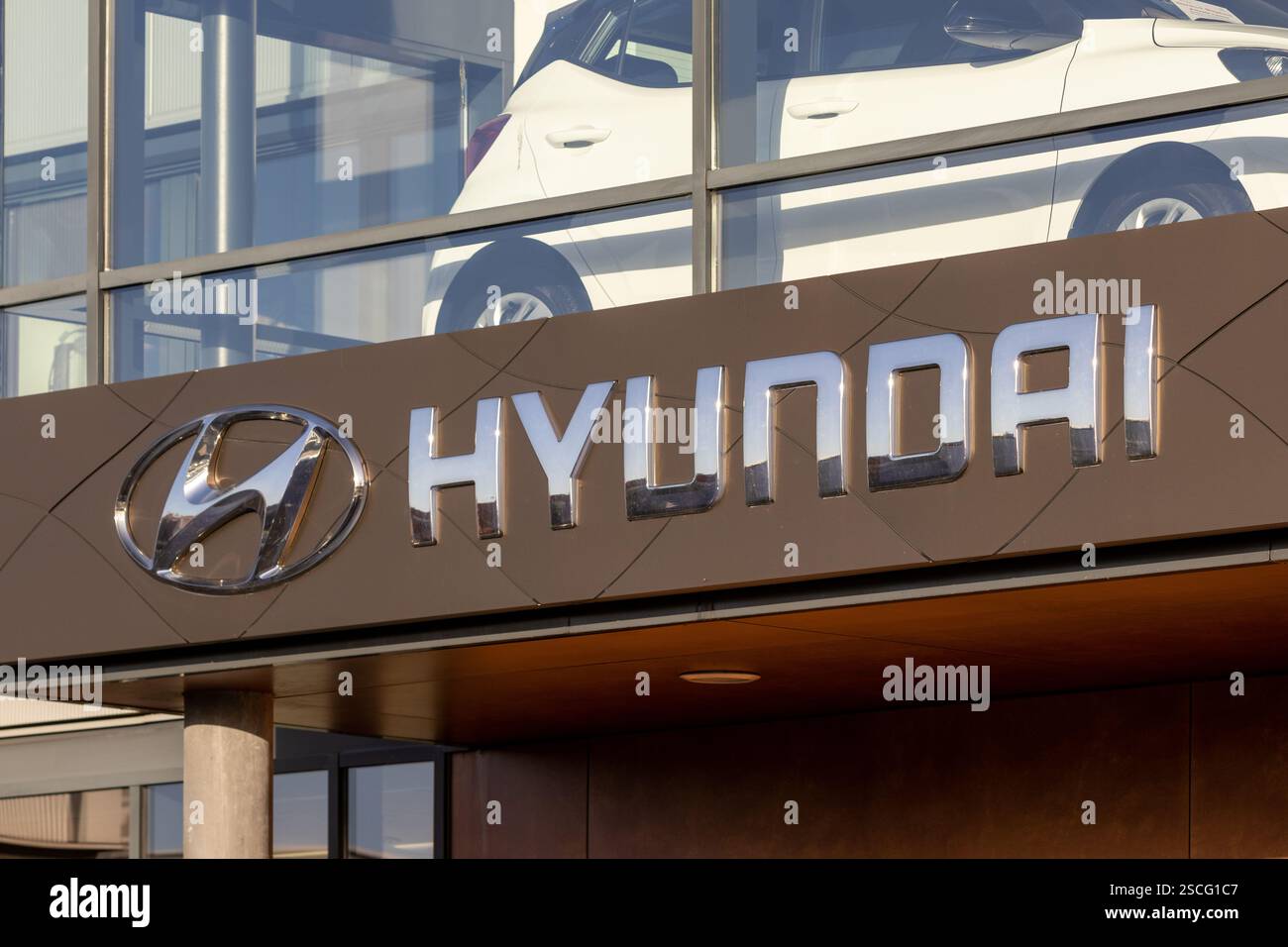 Hyundai logo at the car dealer in Nieuwegein. Hyundai, is a South ...