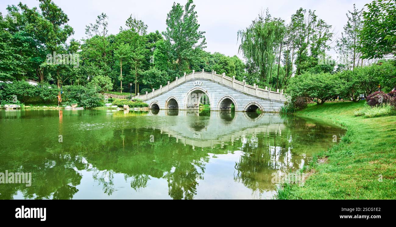 Arch bridge in Huanhuaxi Park, Chengdu, Sichuan, China Stock Photo - Alamy