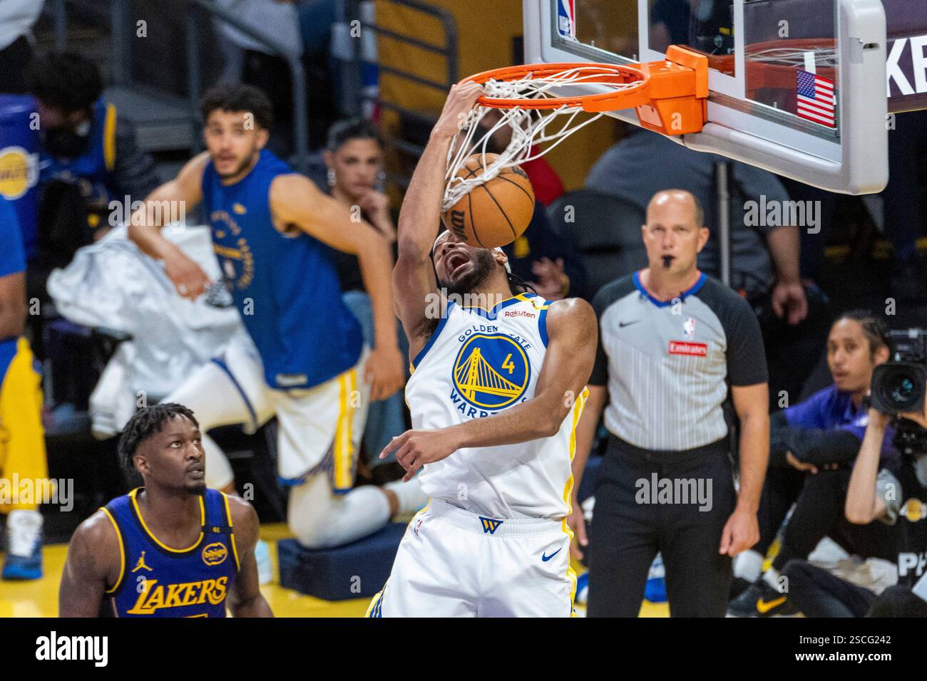 February 6, 2025, Los Angeles, California, USA: Golden State Warriors' Moses Moody #4 dunks ...