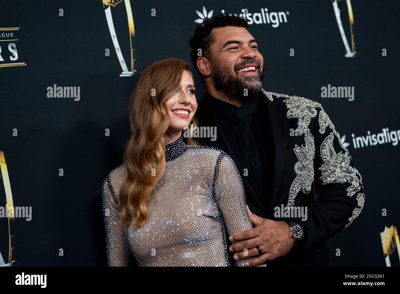 Cam Hayward, and wife Allie Hayward arrive on the NFL Honors red carpet ...