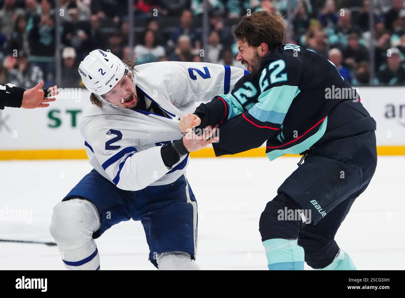 Toronto Maple Leafs defenseman Simon Benoit fights with Seattle Kraken ...