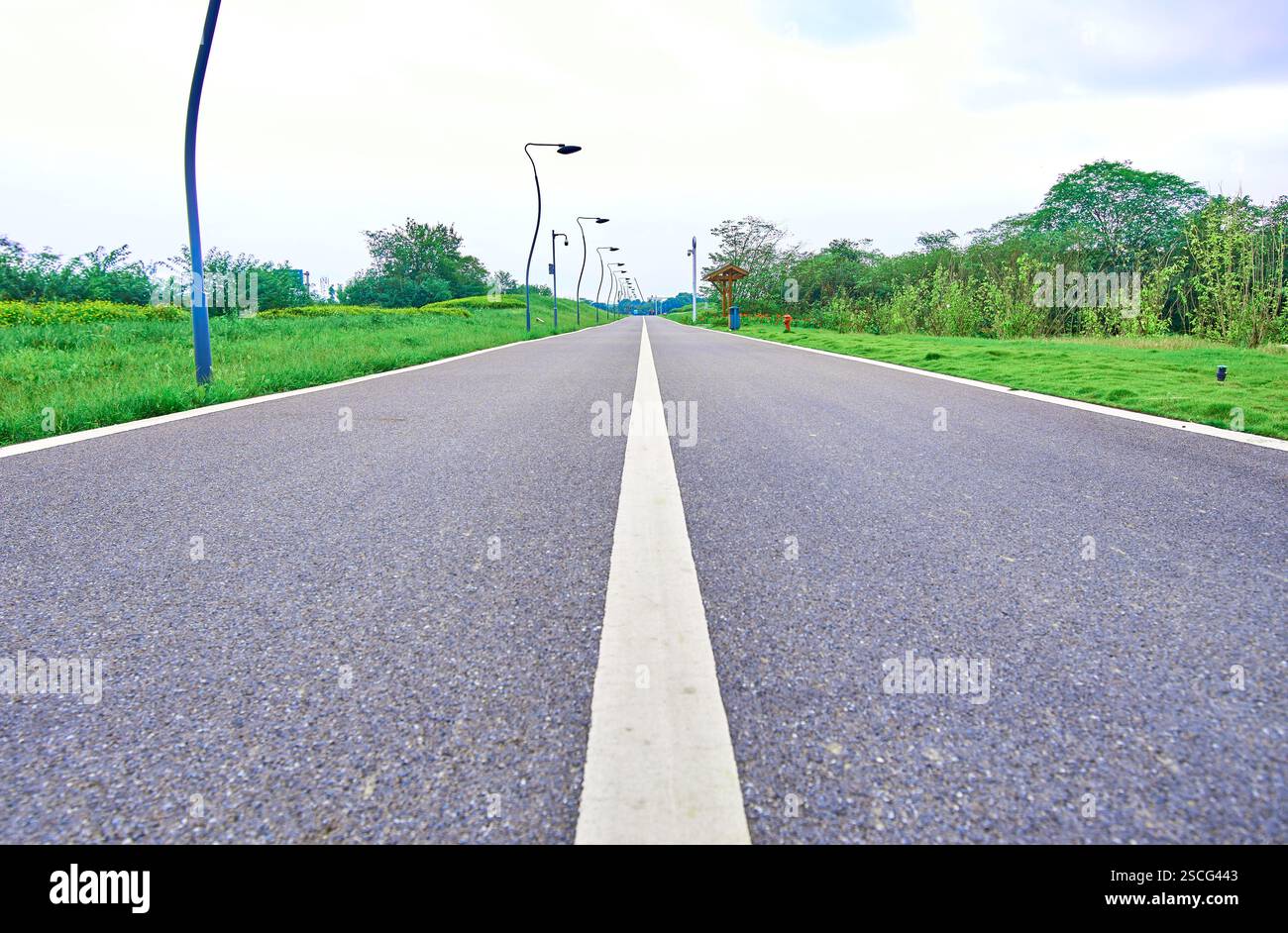 A straight road stretches into the distance Stock Photo - Alamy