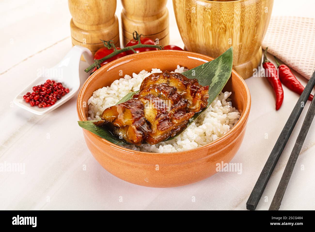 Grilled eel with steamed rice and unagi sauce Stock Photo - Alamy