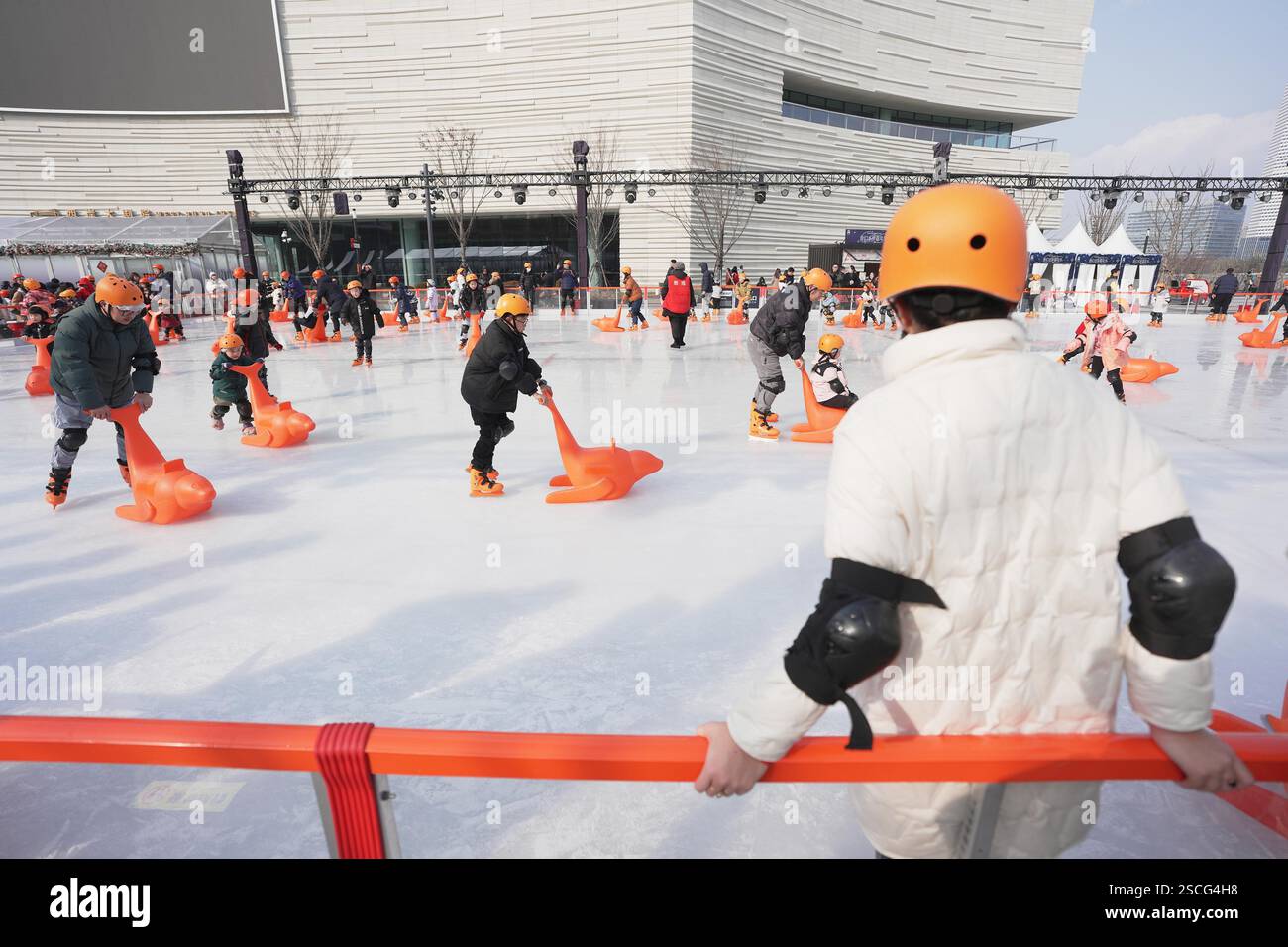 **CHINESE MAINLAND, HONG KONG, MACAU AND TAIWAN OUT** Visitors skate at ...