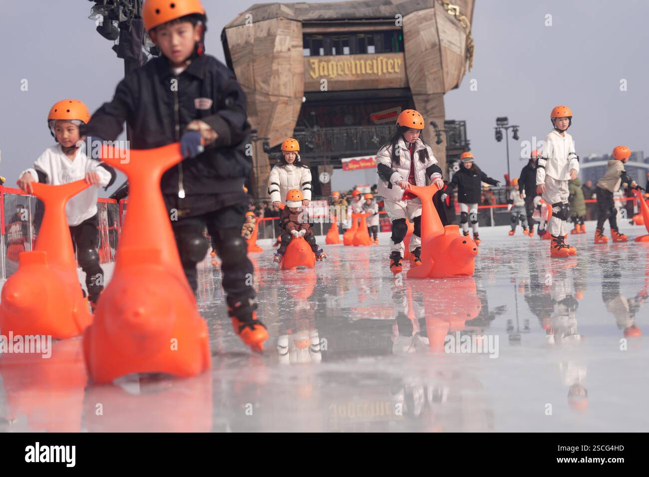 **CHINESE MAINLAND, HONG KONG, MACAU AND TAIWAN OUT** Visitors skate at ...