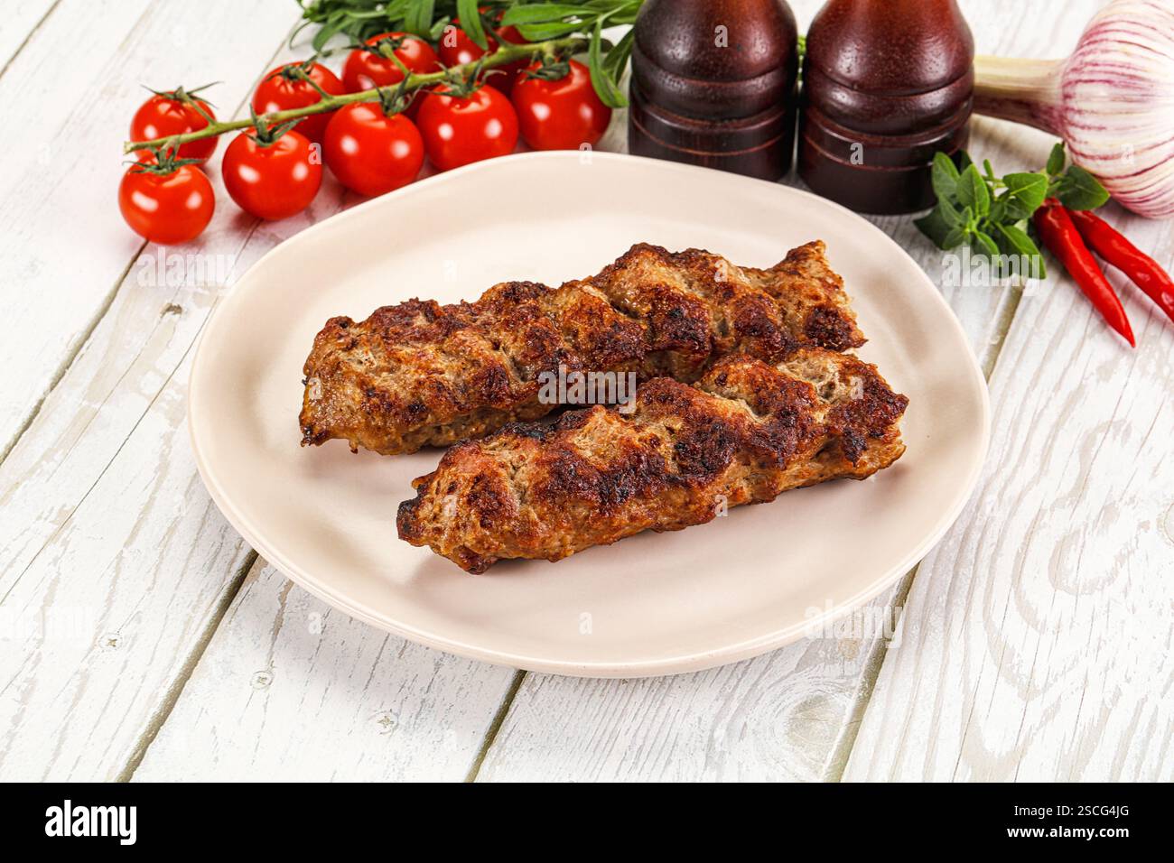 Chicken barbecue kebab minced meat and spices Stock Photo - Alamy
