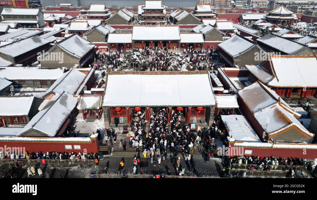 Tourists visit the Mukden Palace in Shenyang City, northeast China's ...