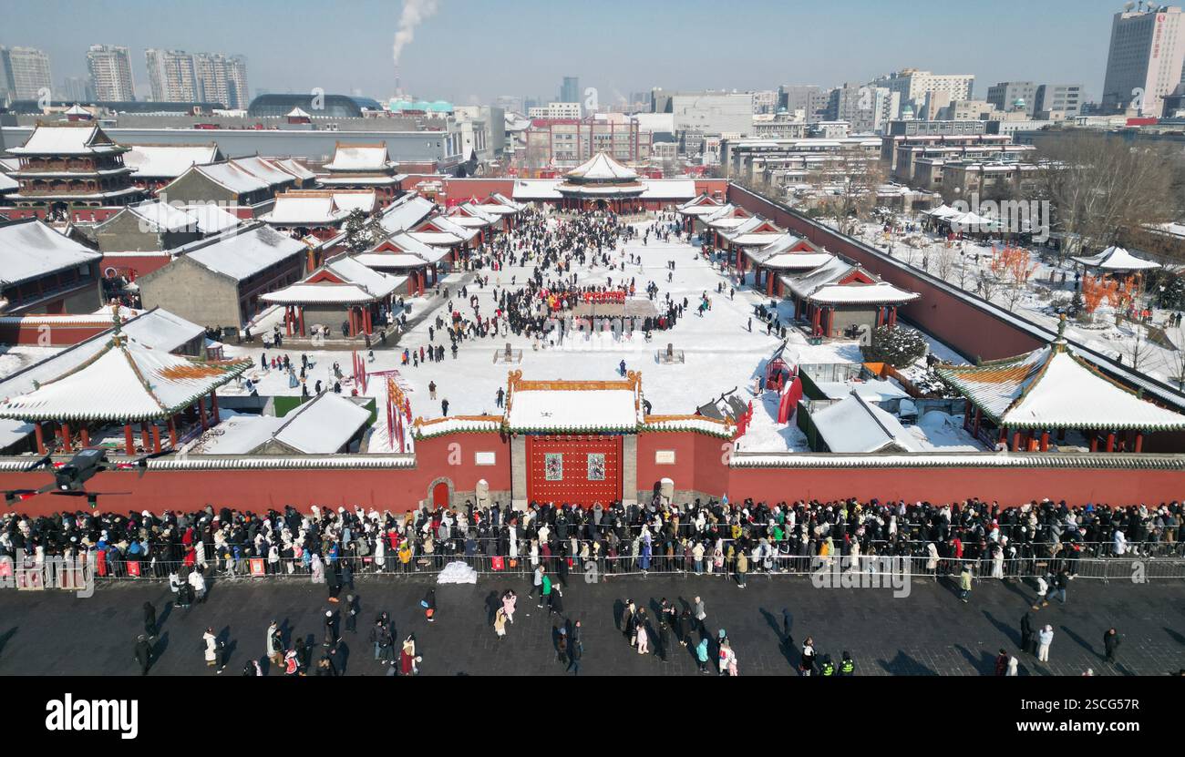 Tourists visit the Mukden Palace in Shenyang City, northeast China's ...