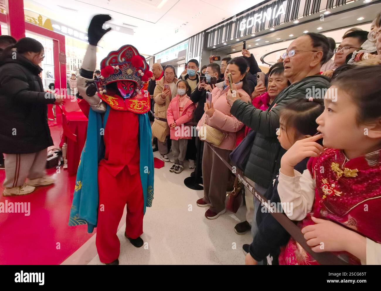 People visit an AI-themed technology temple fair in Beijing, China, 31 ...