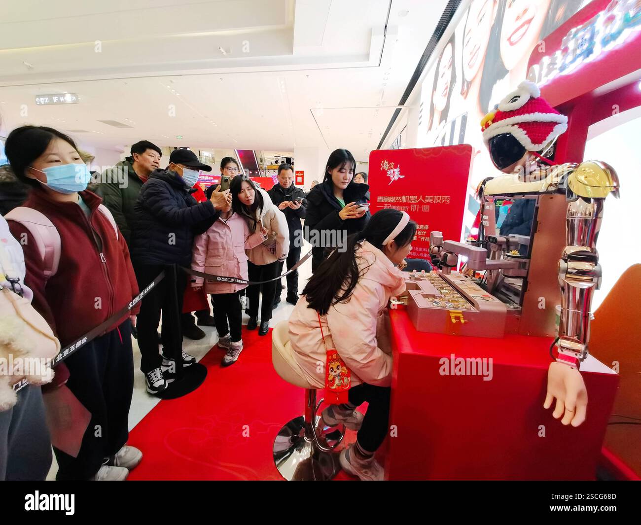 People visit an AI-themed technology temple fair in Beijing, China, 31 ...