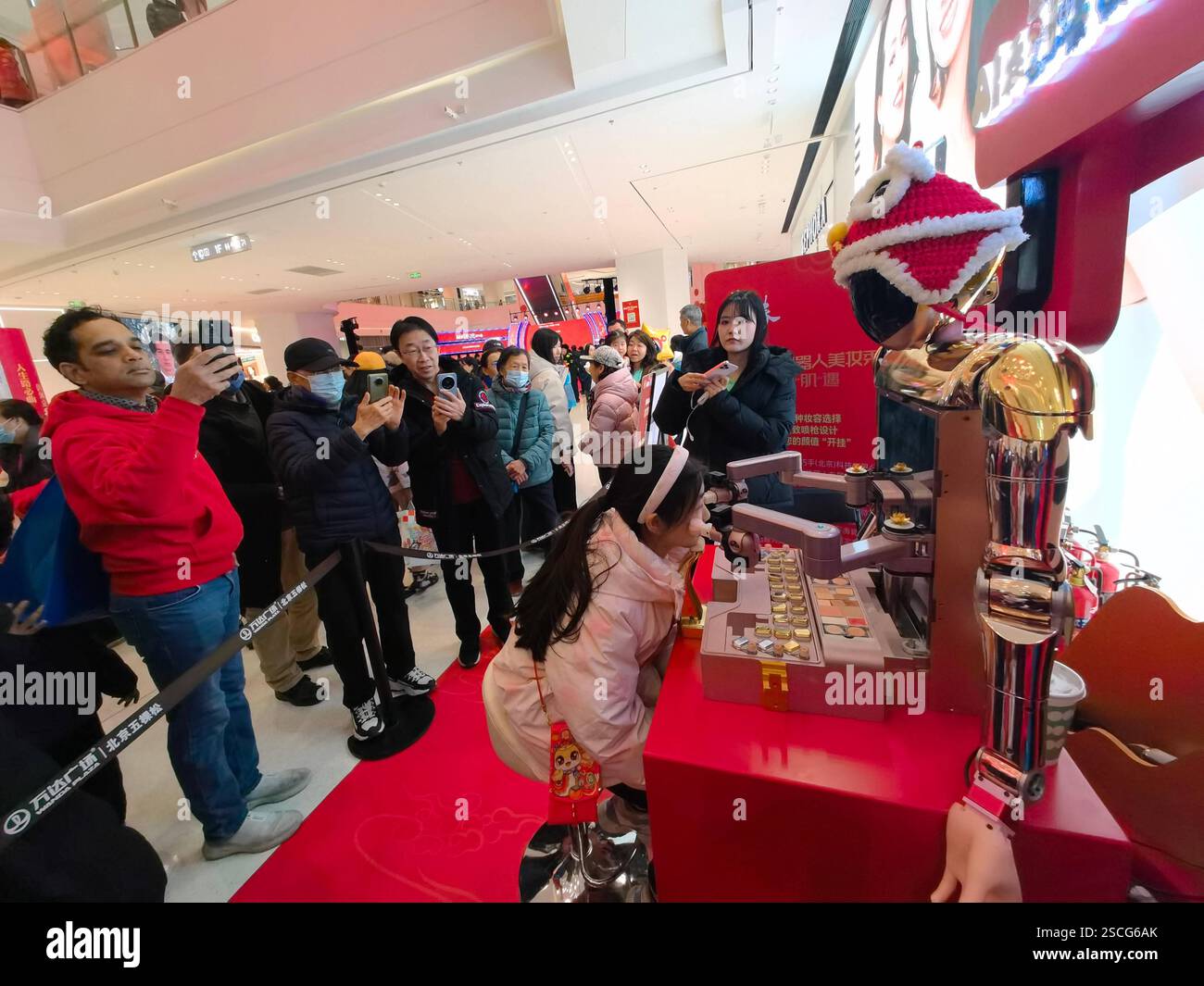 People visit an AI-themed technology temple fair in Beijing, China, 31 ...