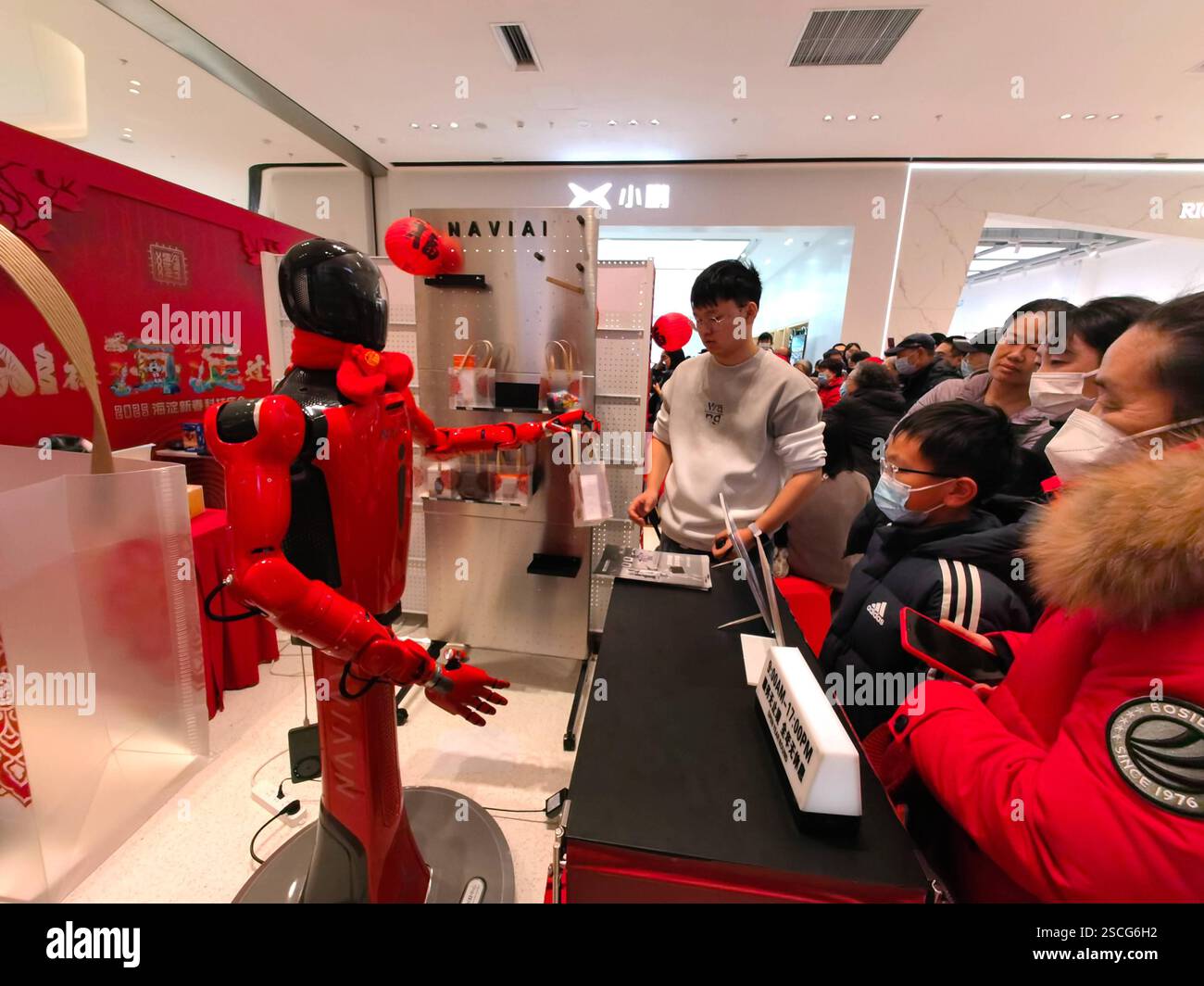 People visit an AI-themed technology temple fair in Beijing, China, 31 ...