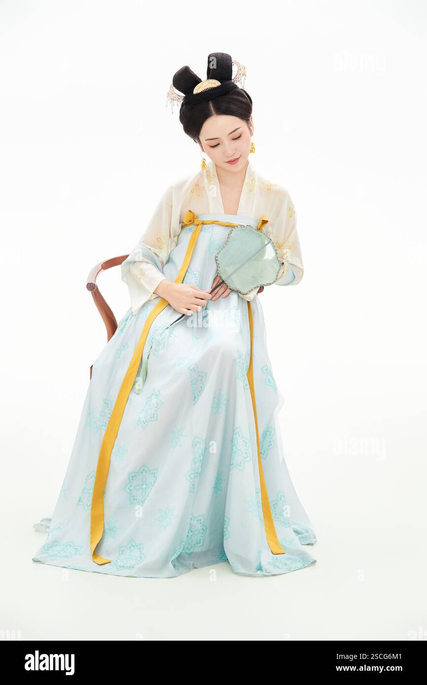 Teenage girl in Chinese Tang Dynasty costume on white background Stock ...