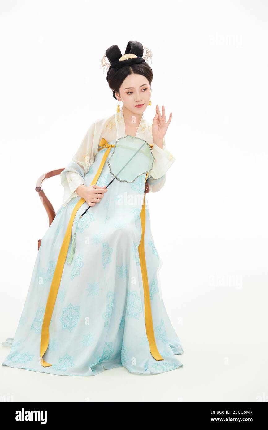 Teenage girl in Chinese Tang Dynasty costume on white background Stock ...