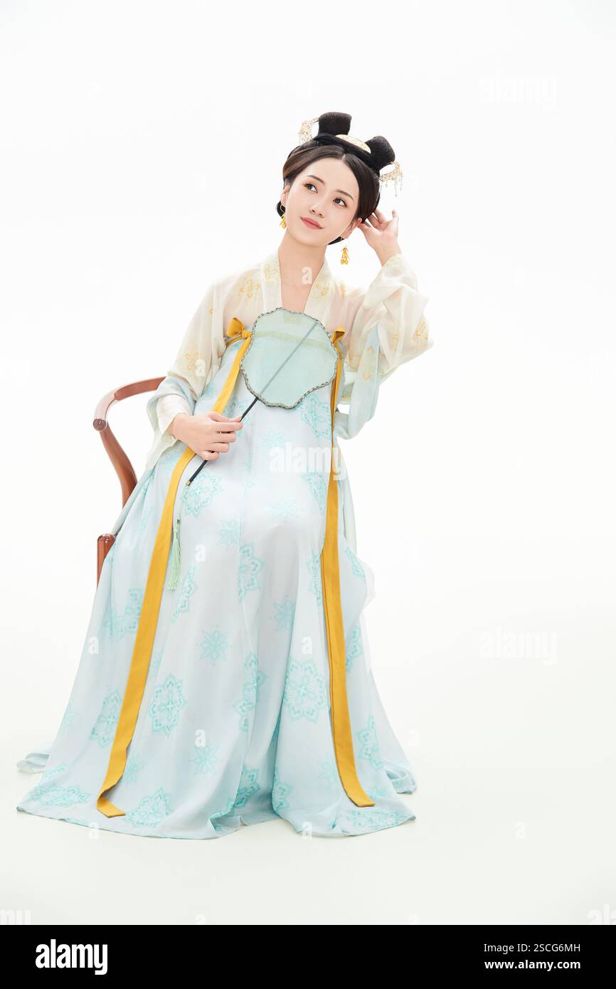 Teenage girl in Chinese Tang Dynasty costume on white background Stock ...