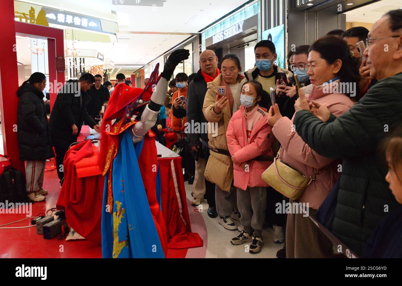 People visit an AI-themed technology temple fair in Beijing, China, 31 ...