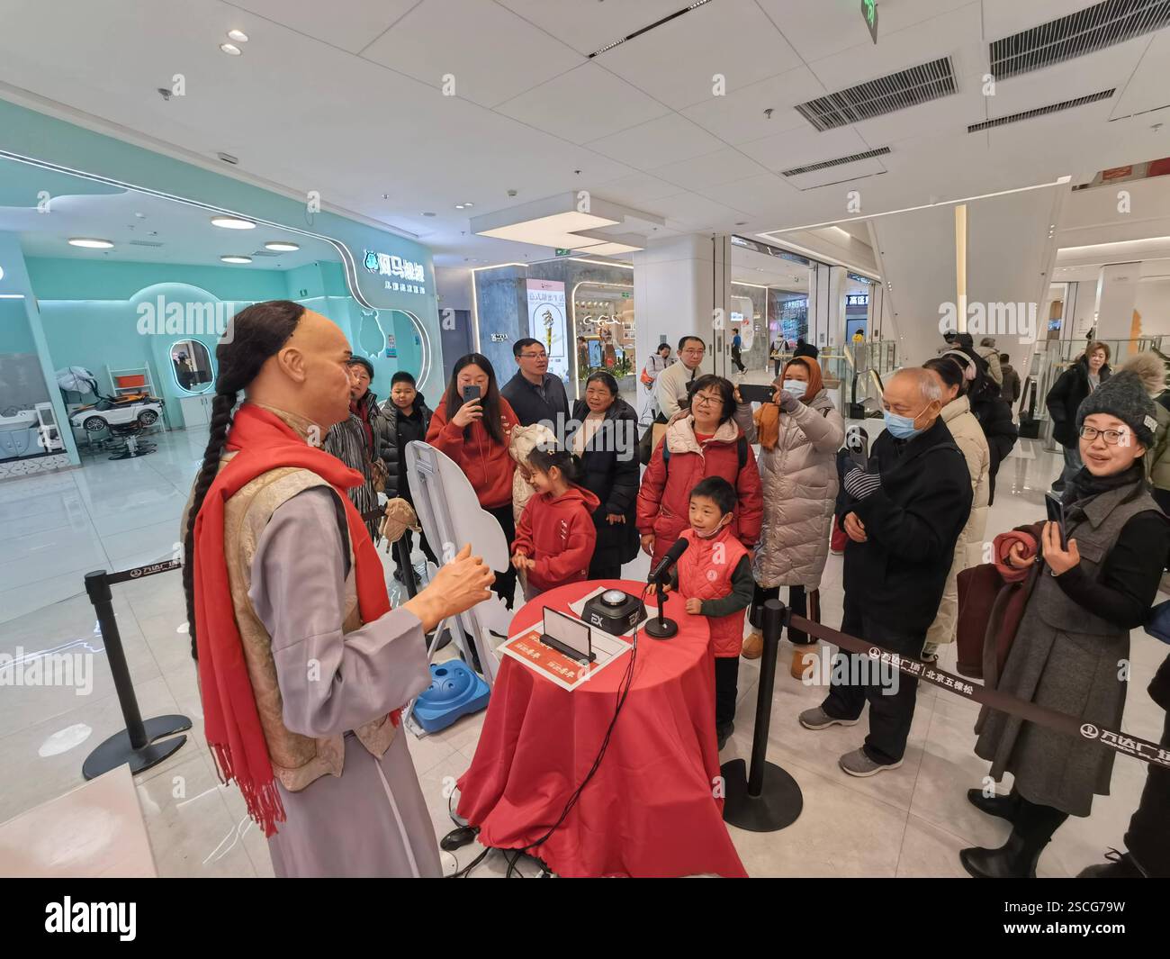 People visit an AI-themed technology temple fair in Beijing, China, 31 ...
