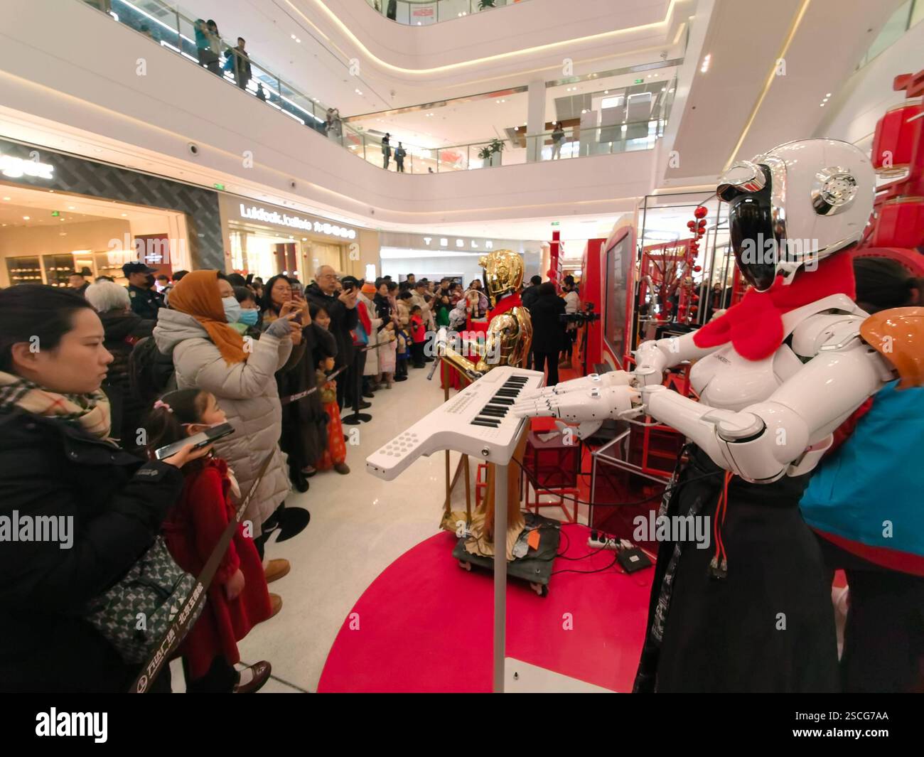 People visit an AI-themed technology temple fair in Beijing, China, 31 ...