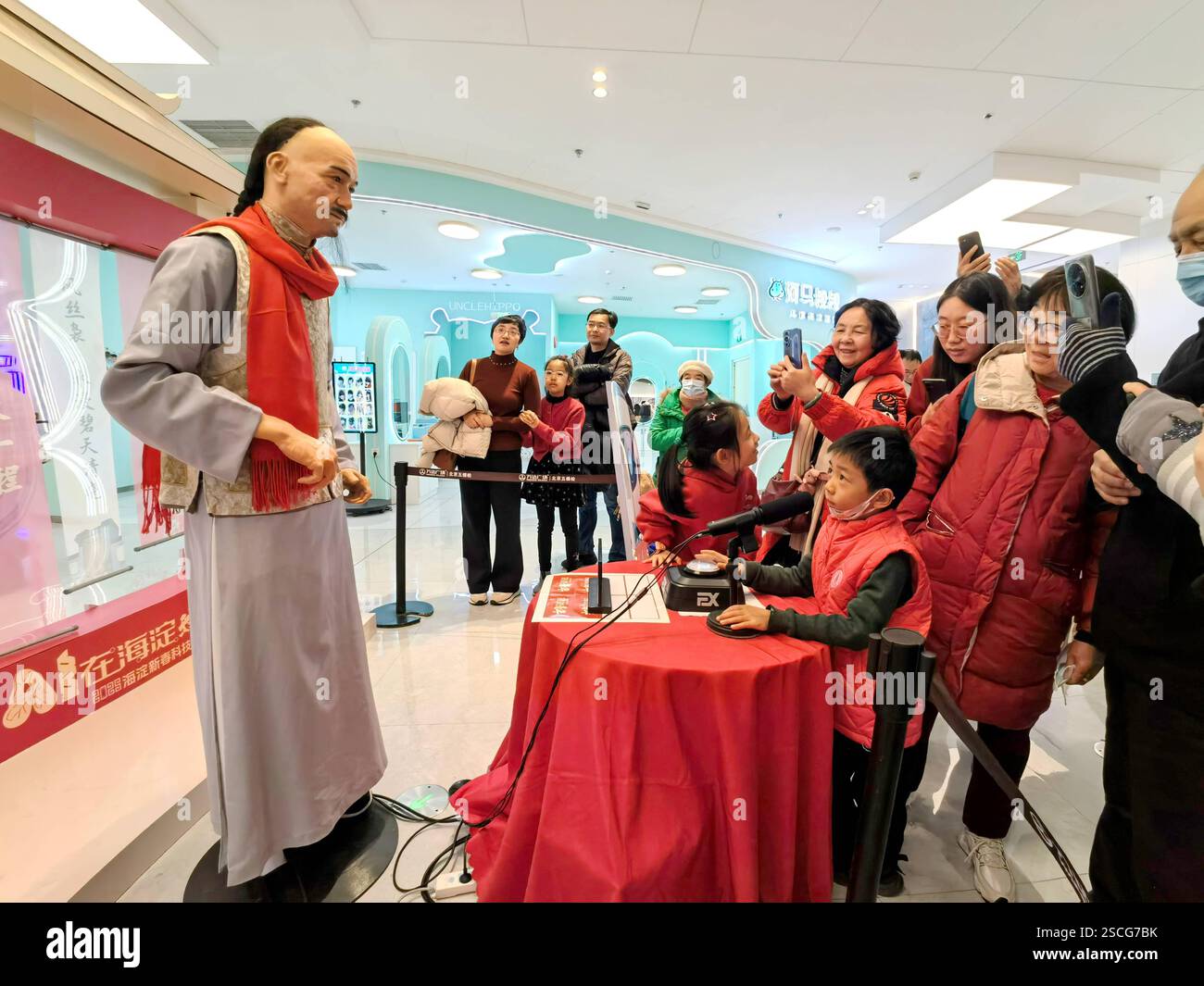 People visit an AI-themed technology temple fair in Beijing, China, 31 ...