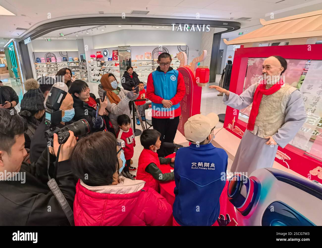 People visit an AI-themed technology temple fair in Beijing, China, 31 ...