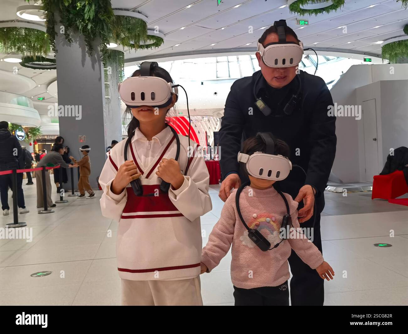 People visit an AI-themed technology temple fair in Beijing, China, 31 ...