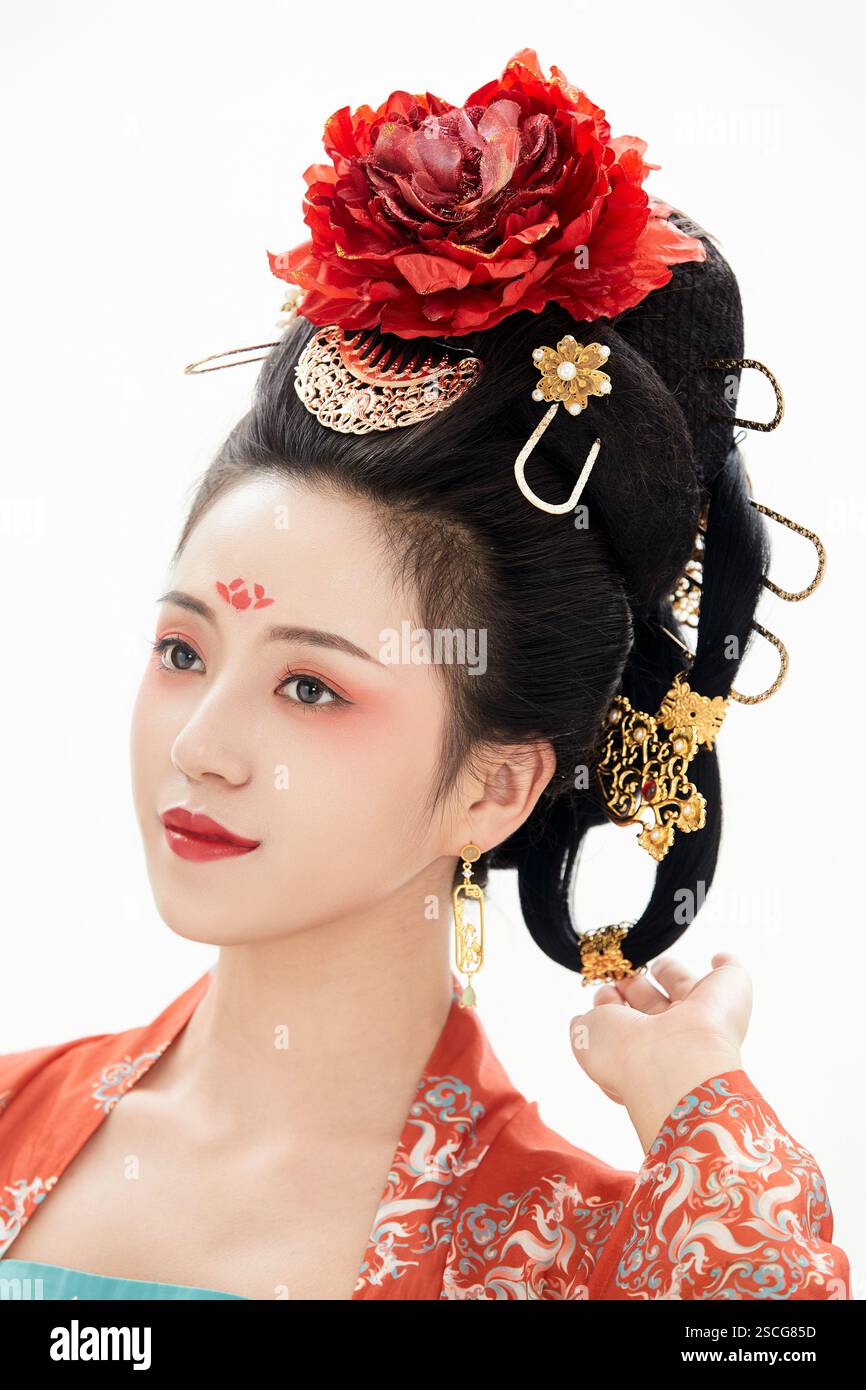 Teenage girl in Chinese Tang Dynasty costume on white background Stock ...