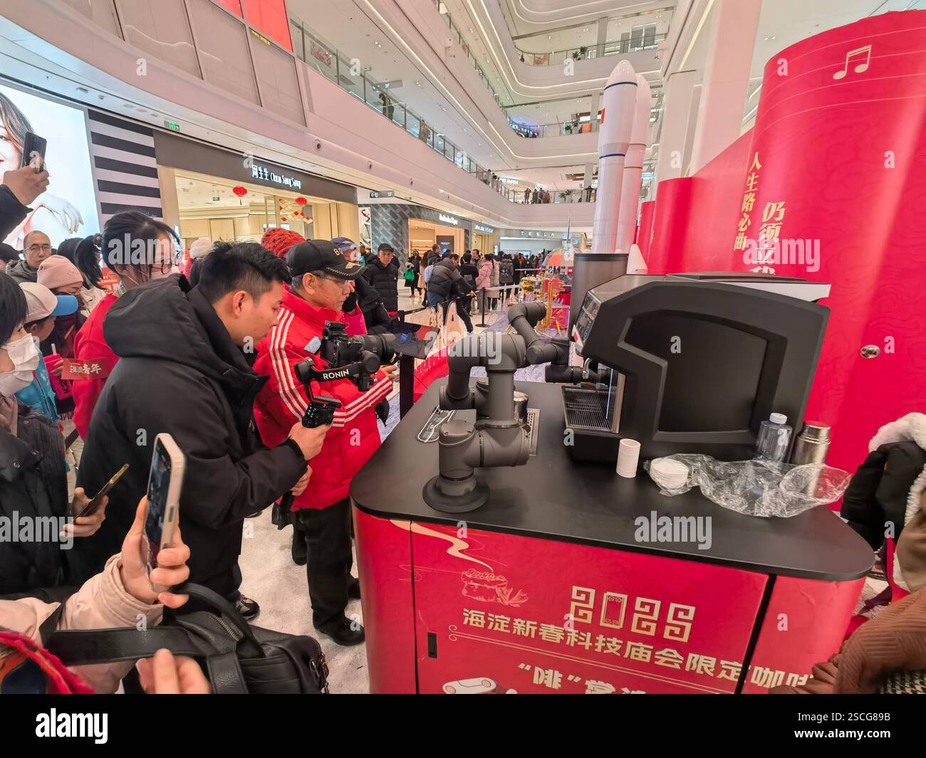 People visit an AI-themed technology temple fair in Beijing, China, 31 ...