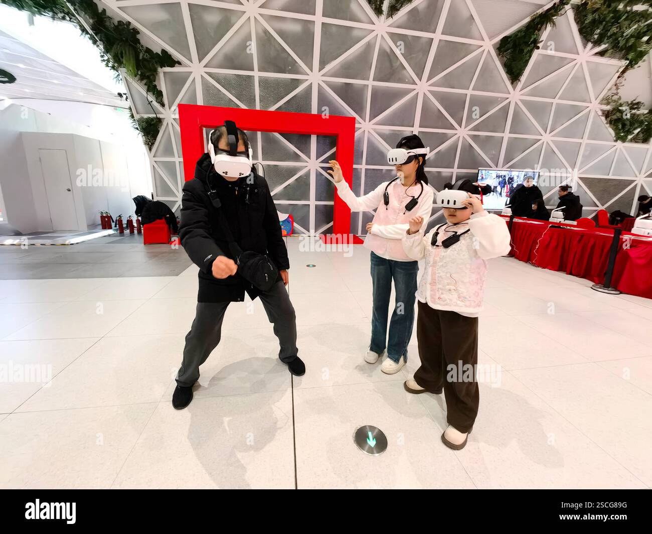 People visit an AI-themed technology temple fair in Beijing, China, 31 ...