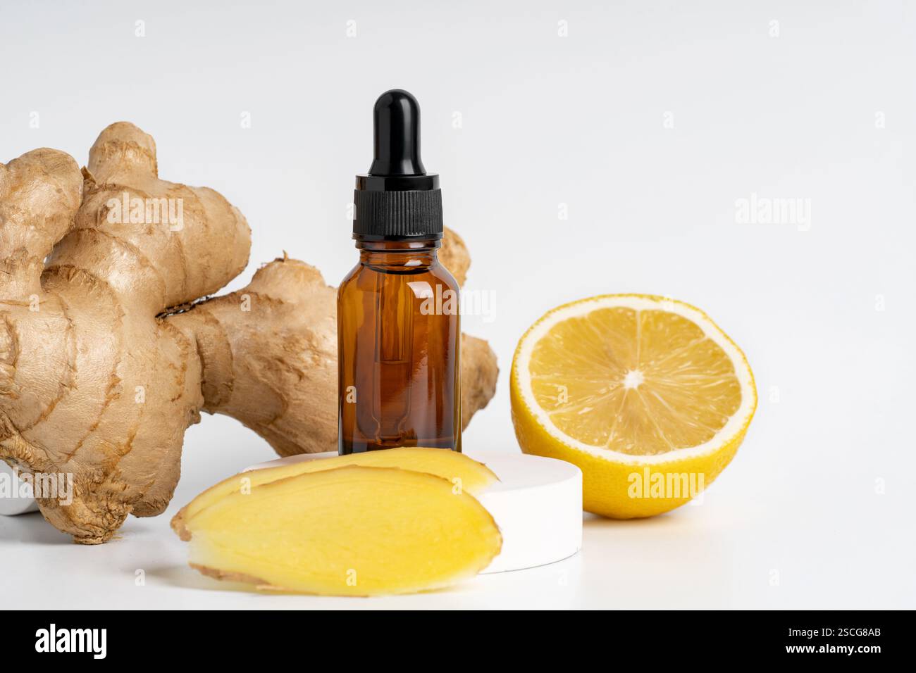 Yellow vitamin C in dropper bottle presenting product on white podium ...