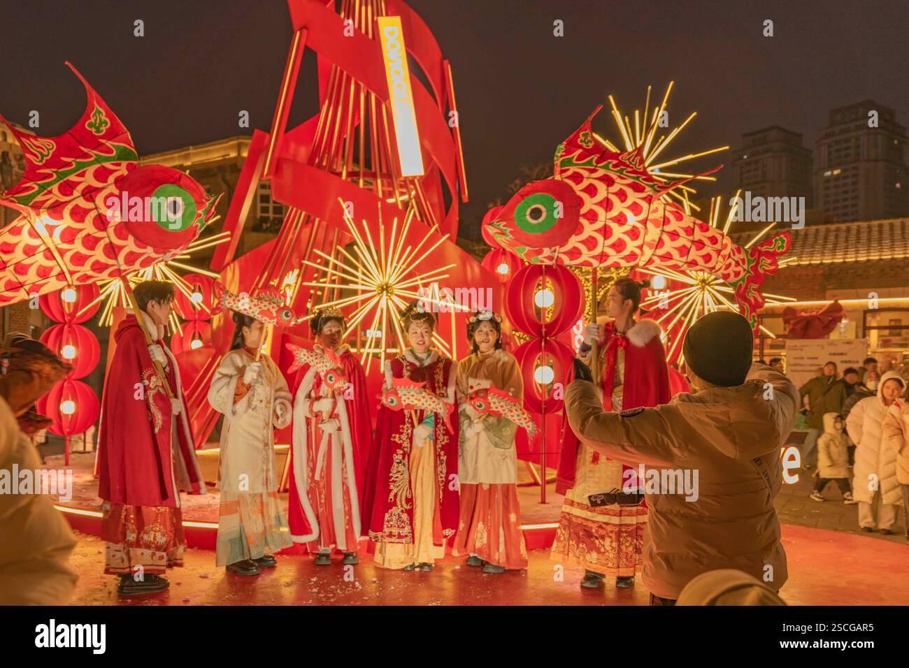 Tourists visit the Dongguan Street in Dalian City, northeast China's ...