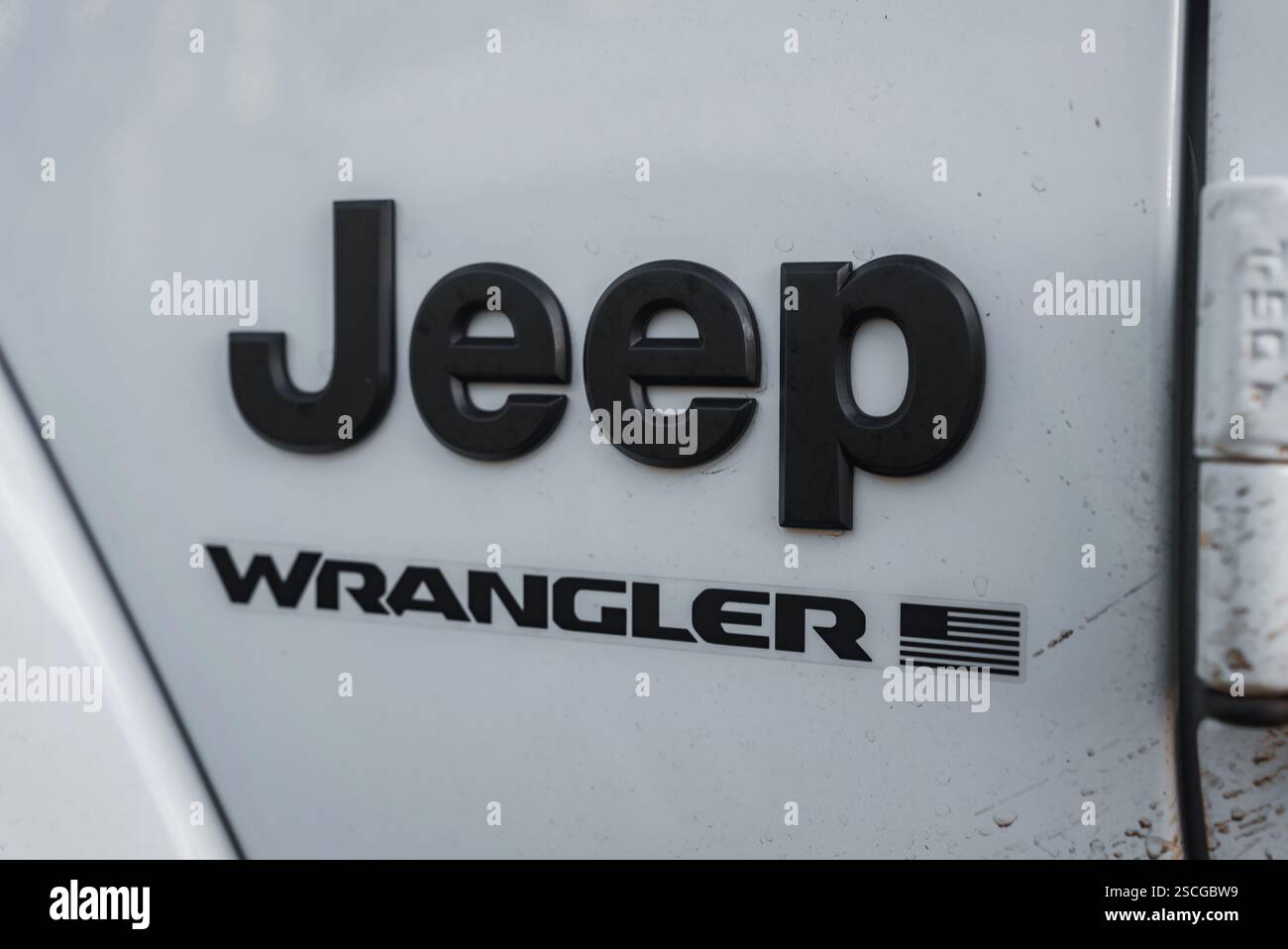 Close Up of Rear Section of White Jeep Wrangler with Logos Stock Photo ...