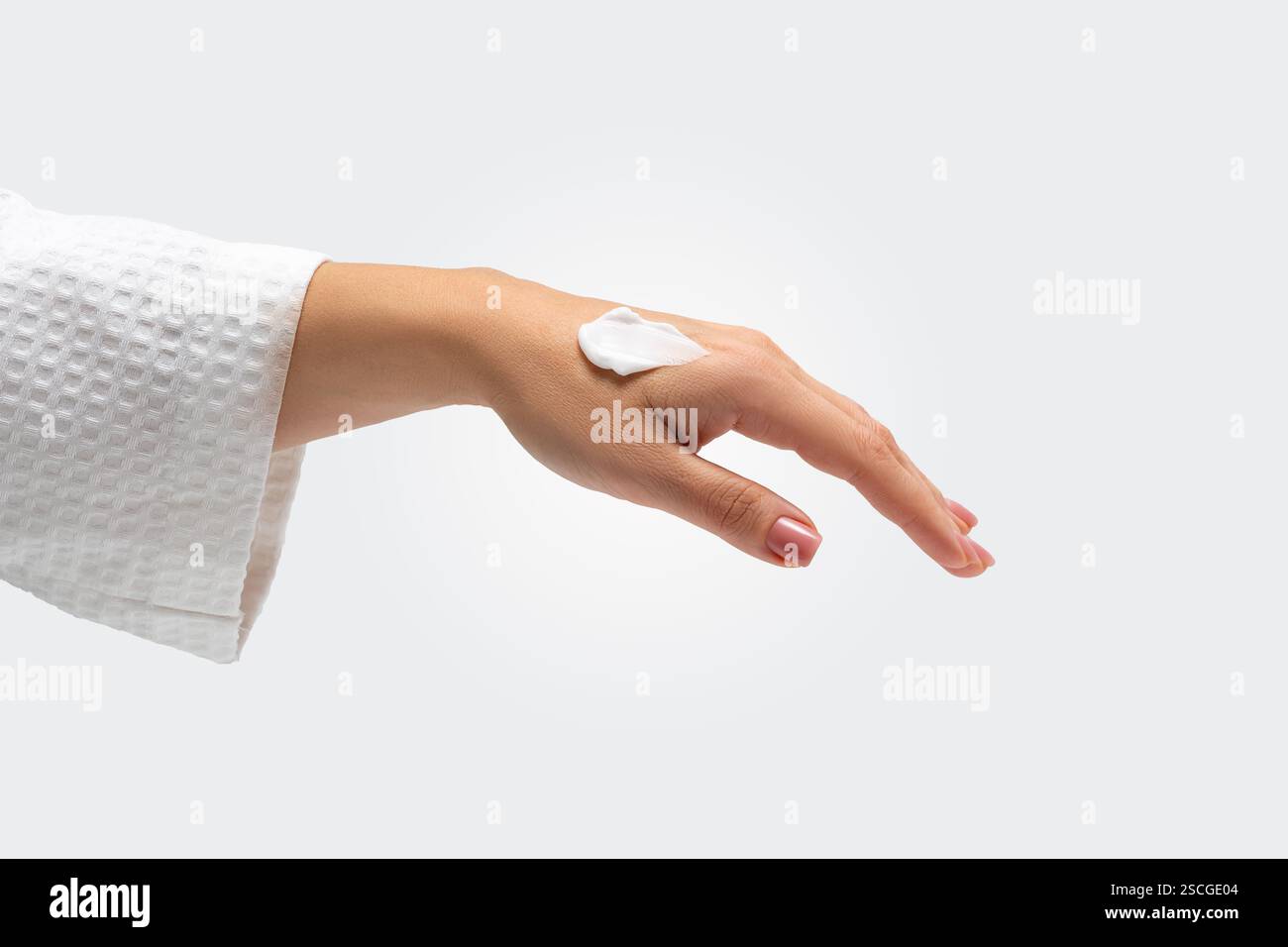 A white smear of body smoothing cream on woman's hand Stock Photo - Alamy