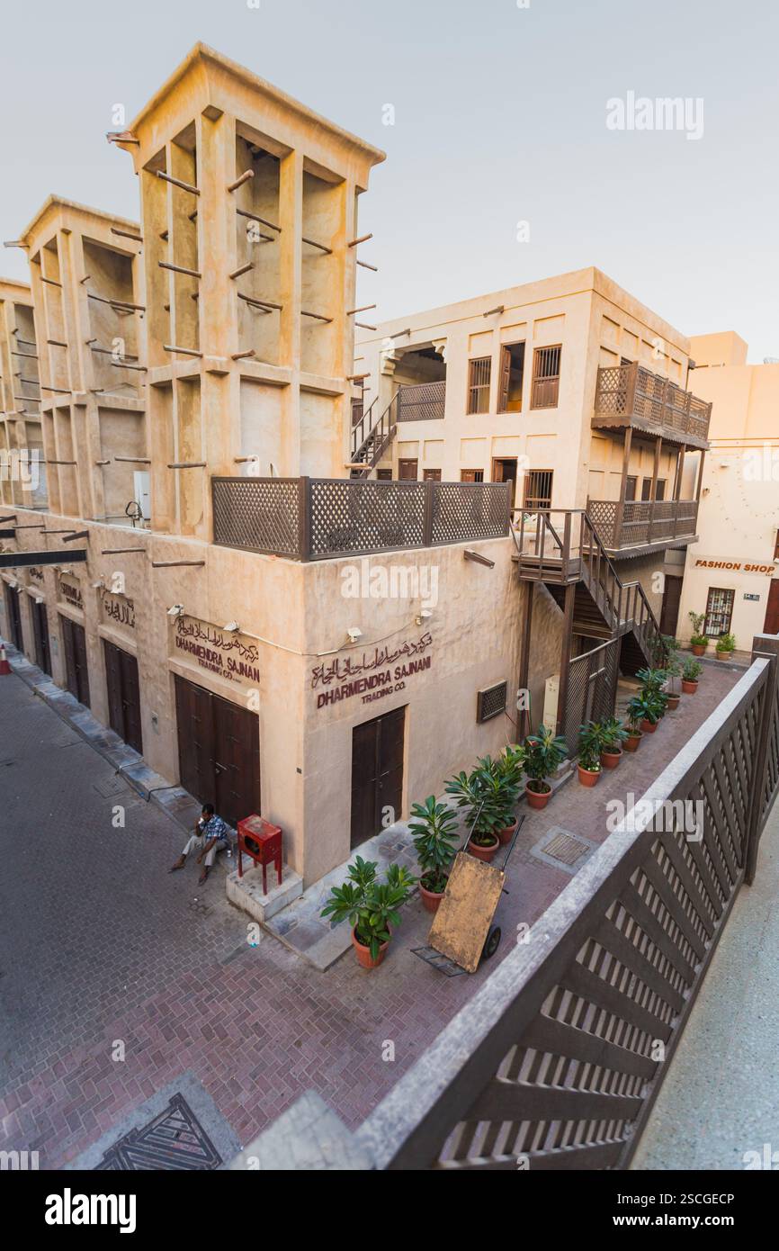 DUBAI, UAE - 8 NOVEMBER 2013: Old buildings and narrow streets in Deira ...