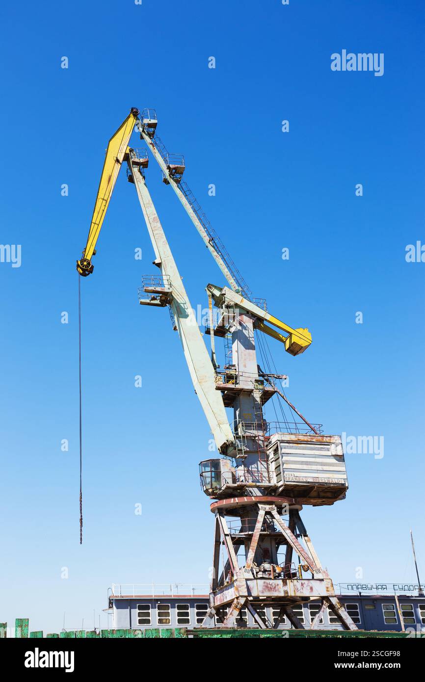 Crane loading cargo in the port on Moscow River, Russia Stock Photo - Alamy