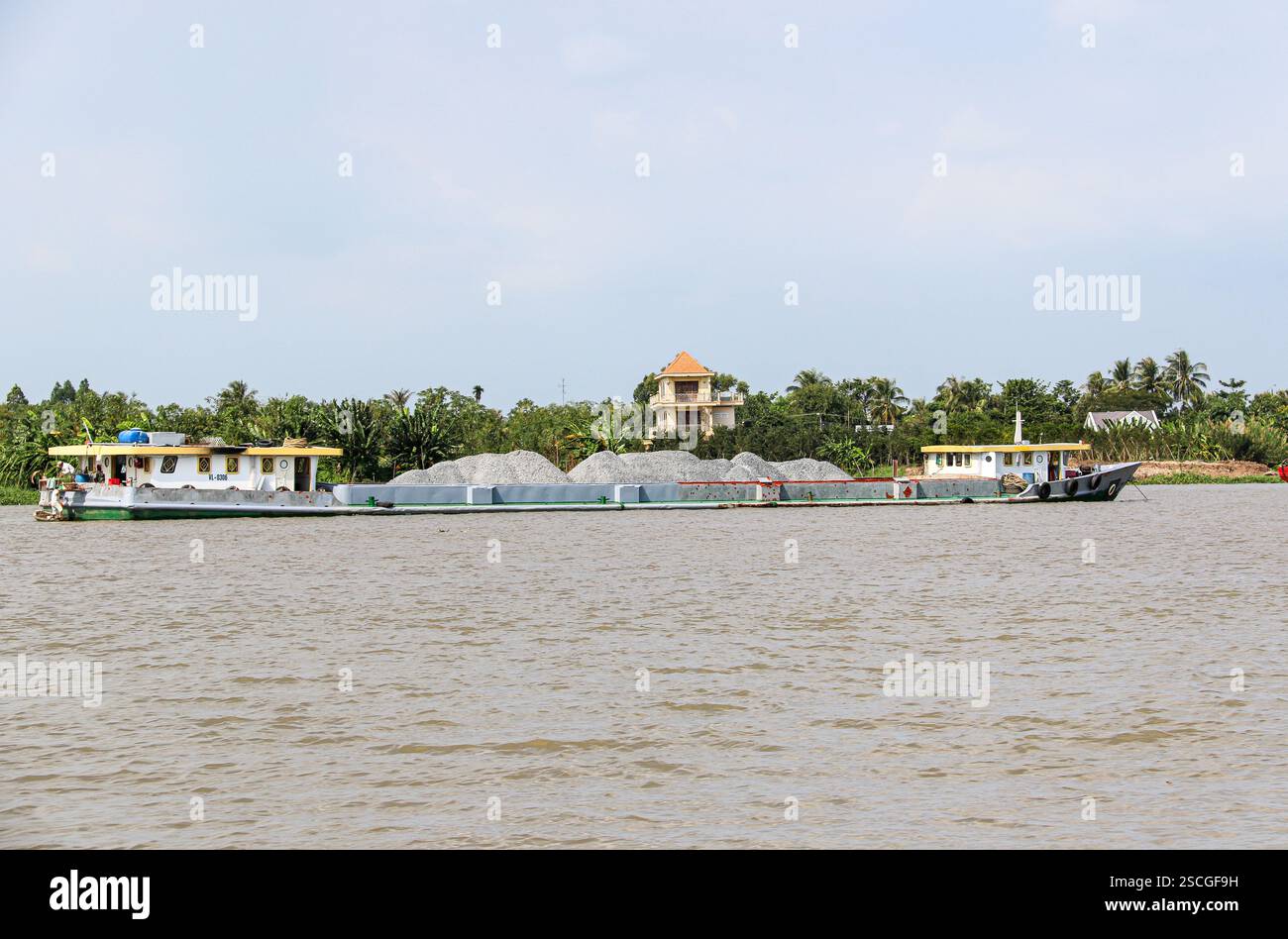 Cargo ship/barge loaded with sand on Mekong River Delta ...