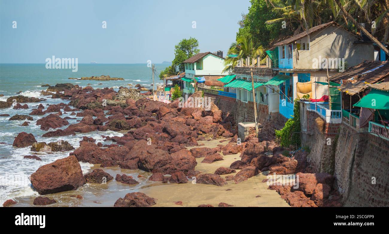 Arambol beach, stones, houses, North Goa, India Stock Photo - Alamy
