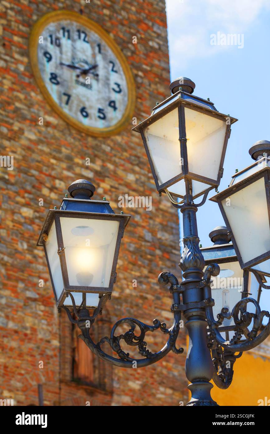vintage street lights on the background of the fortress wall in Italy ...