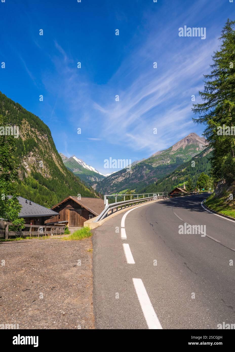 View of Austrian Alps with road passing through Hohe Tauern National ...
