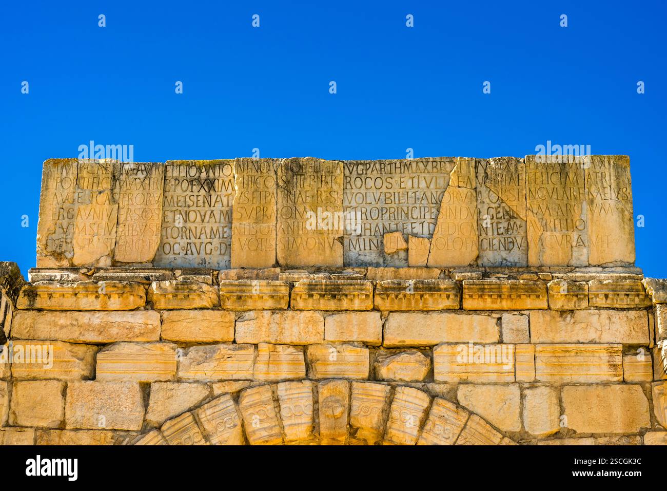The inscription on the top of the Caracalla Arch, Volubilis Roman Ruins ...