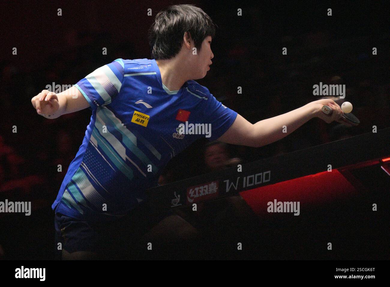 Singapore. 7th Feb, 2025. Kuai Man hits a return during the women's ...