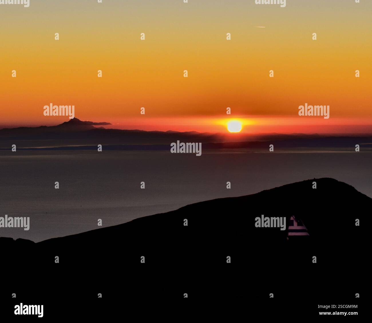 Sun rise in the aegean sea from mount olympus Stock Photo - Alamy